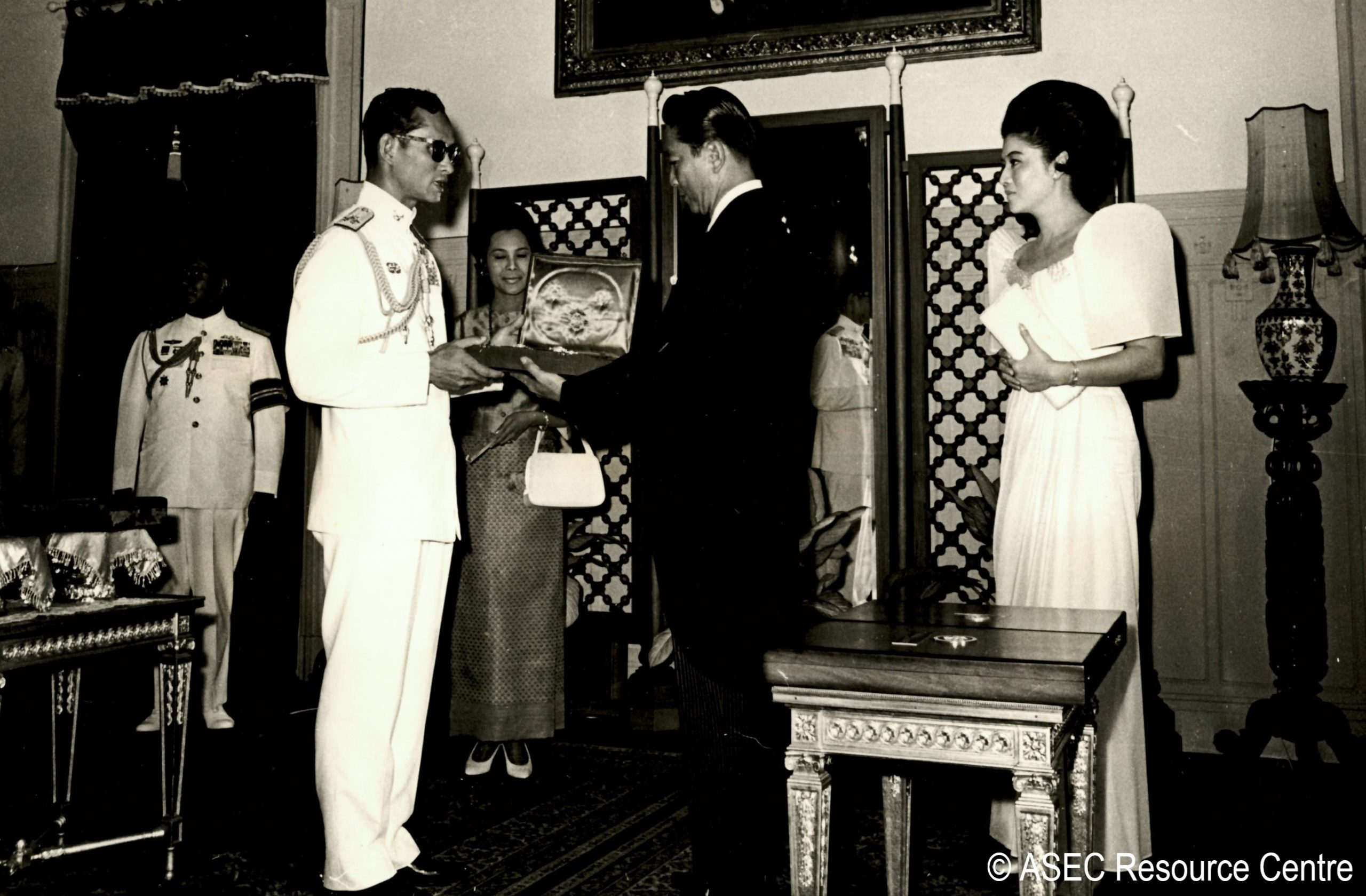 President Ferdinand E. Marcos receives an award from His Majesty, King ...